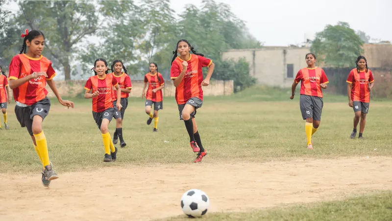 How ‘One girl one football’ is breaking stereotypes and empowering ...
